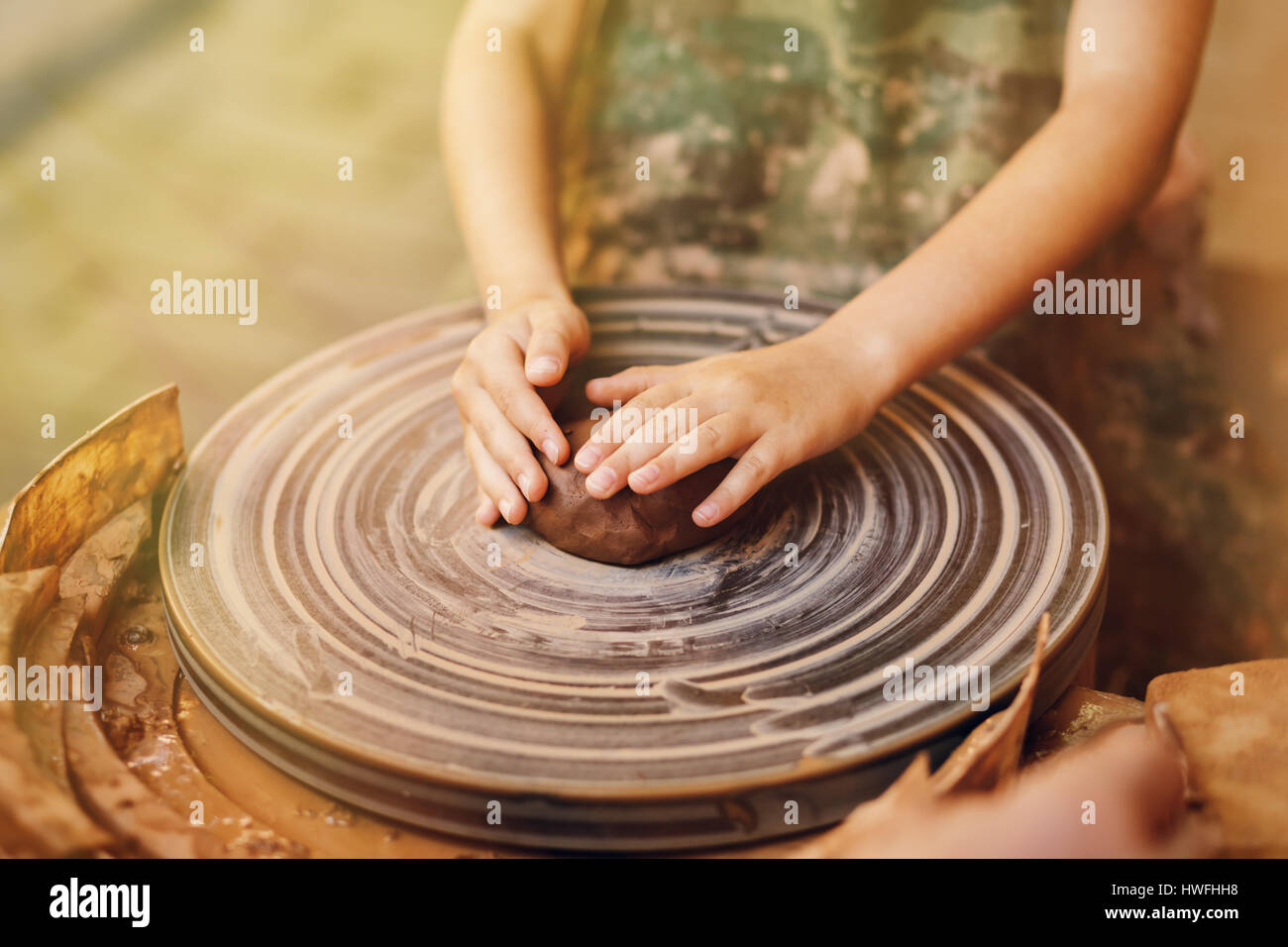 Child learning clay modeling Stock Photo - Alamy
