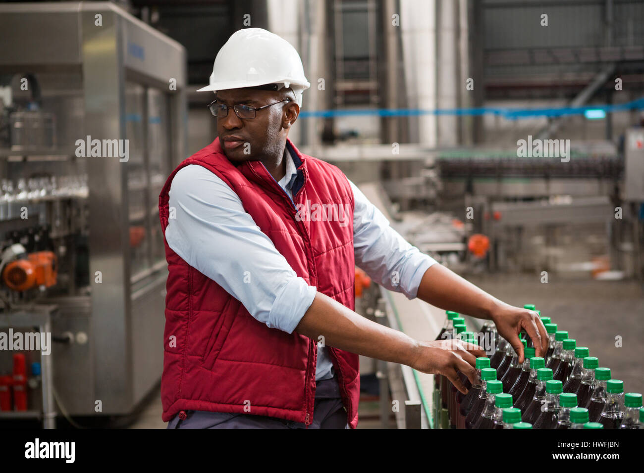 Arranging bottles hi-res stock photography and images - Alamy
