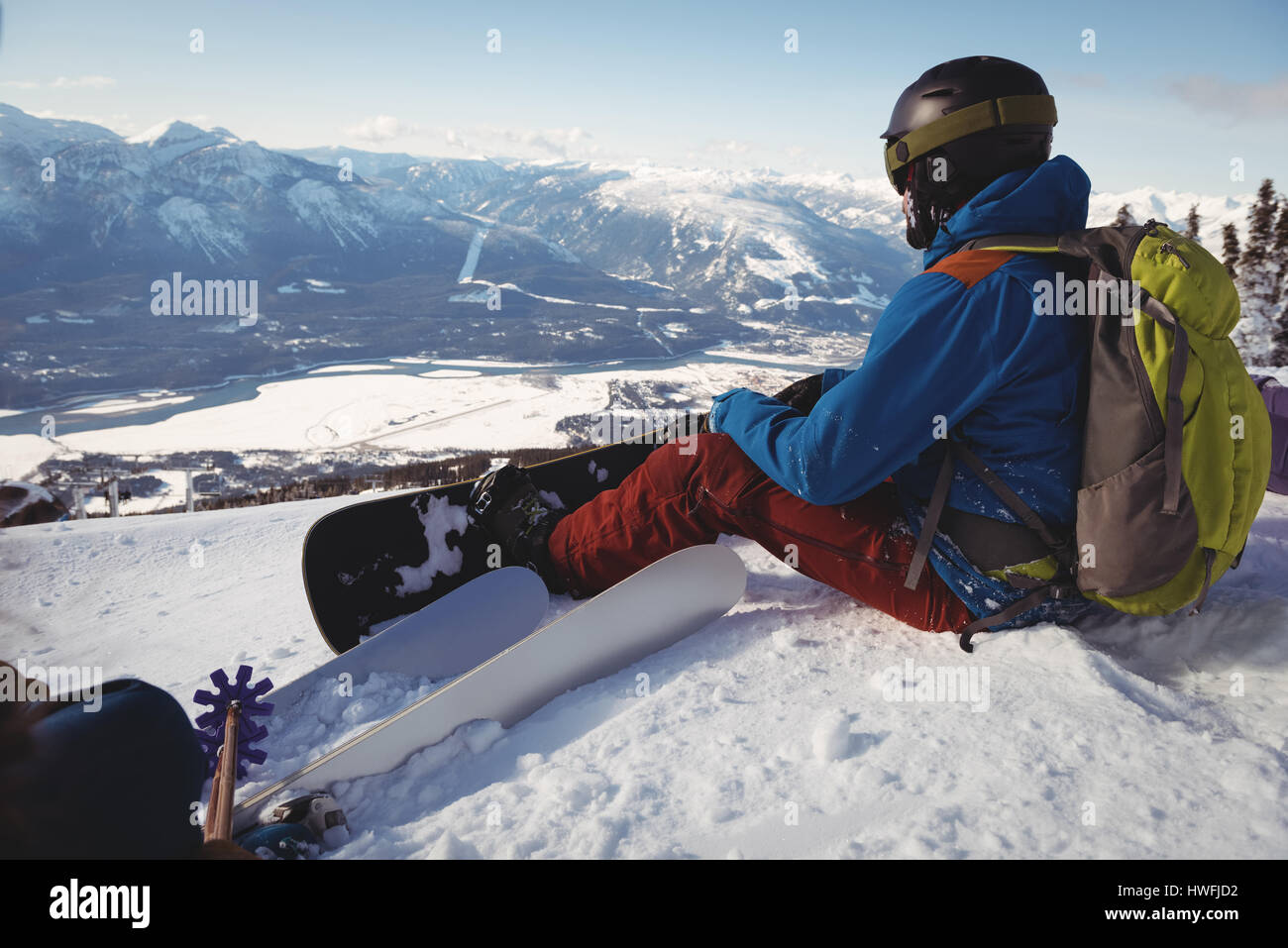 Skier relaxing on snow landscape during winter Stock Photo - Alamy
