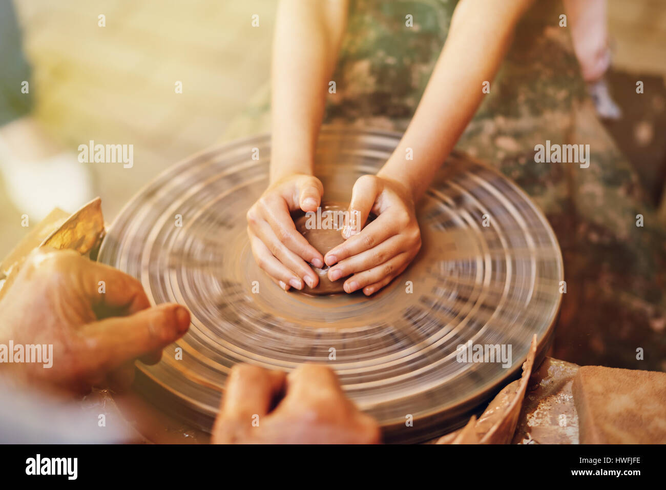 Child learning clay modeling Stock Photo - Alamy