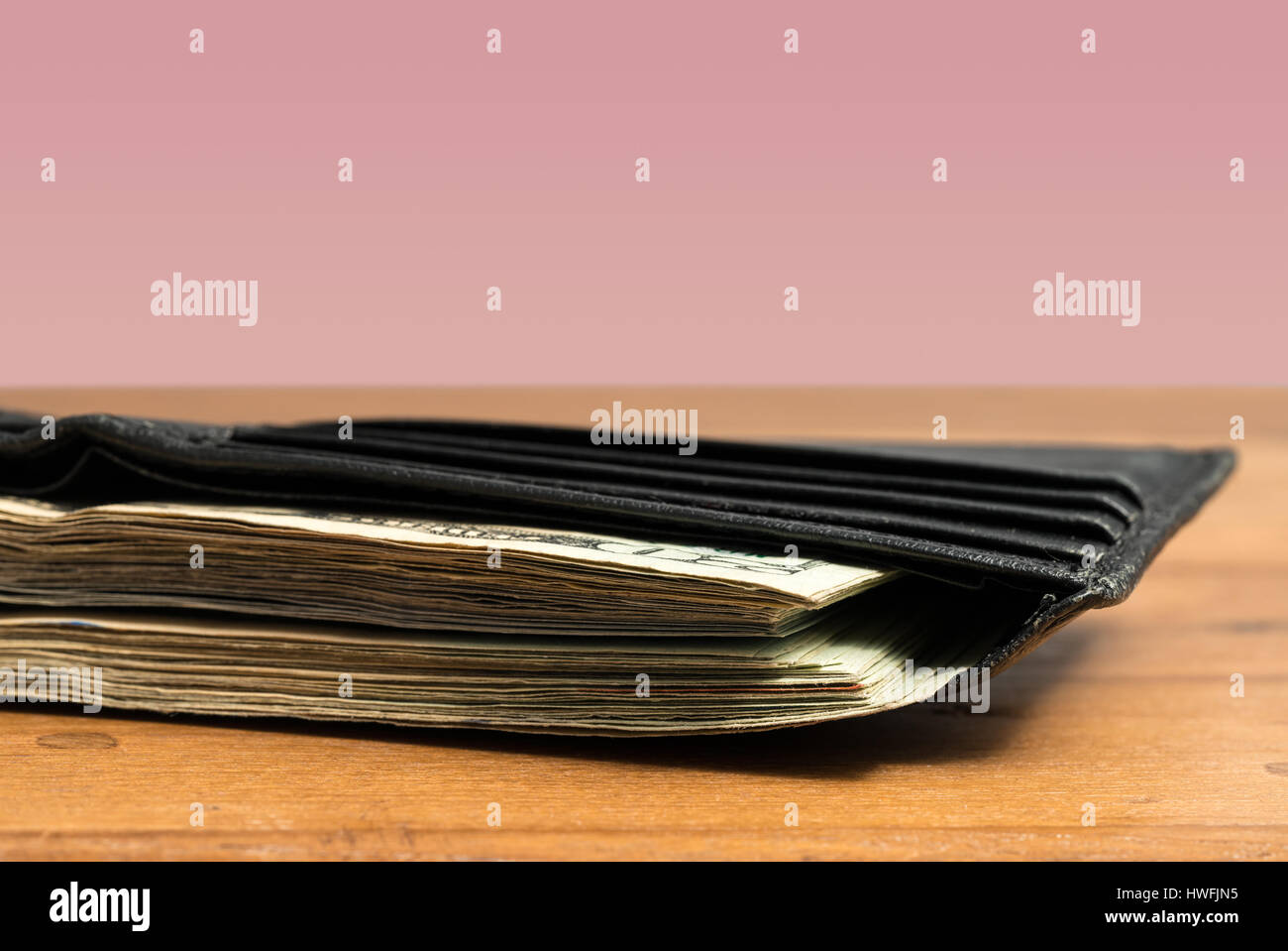 Wad of dollar hi-res stock photography and images - Alamy