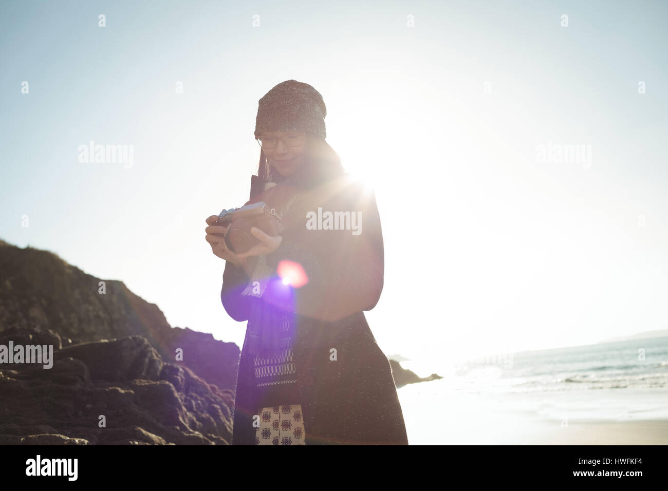 Smiling tourist woman camera hi-res stock photography and images - Alamy
