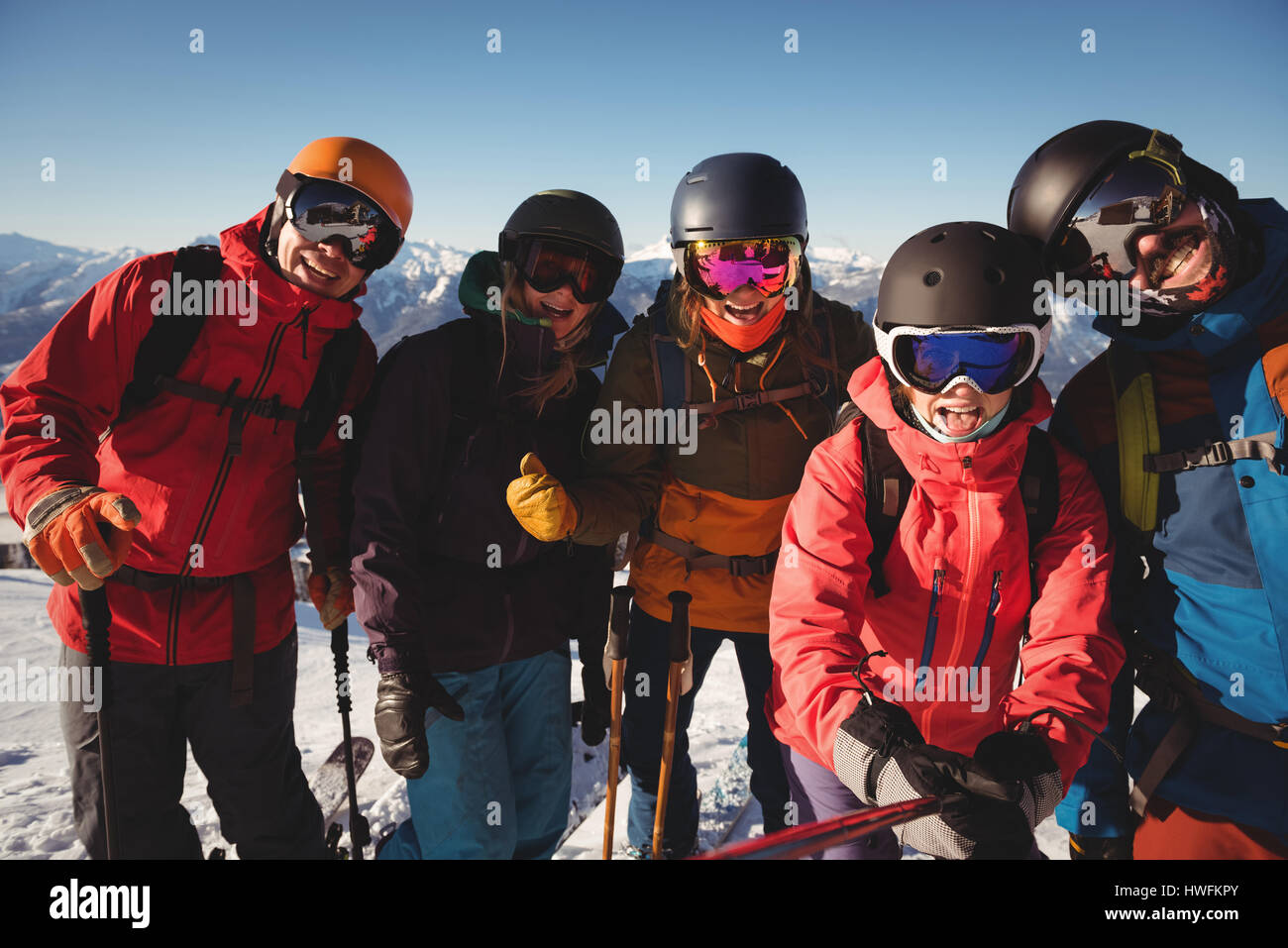 Group of skiers having fun in ski resort during winter Stock Photo - Alamy