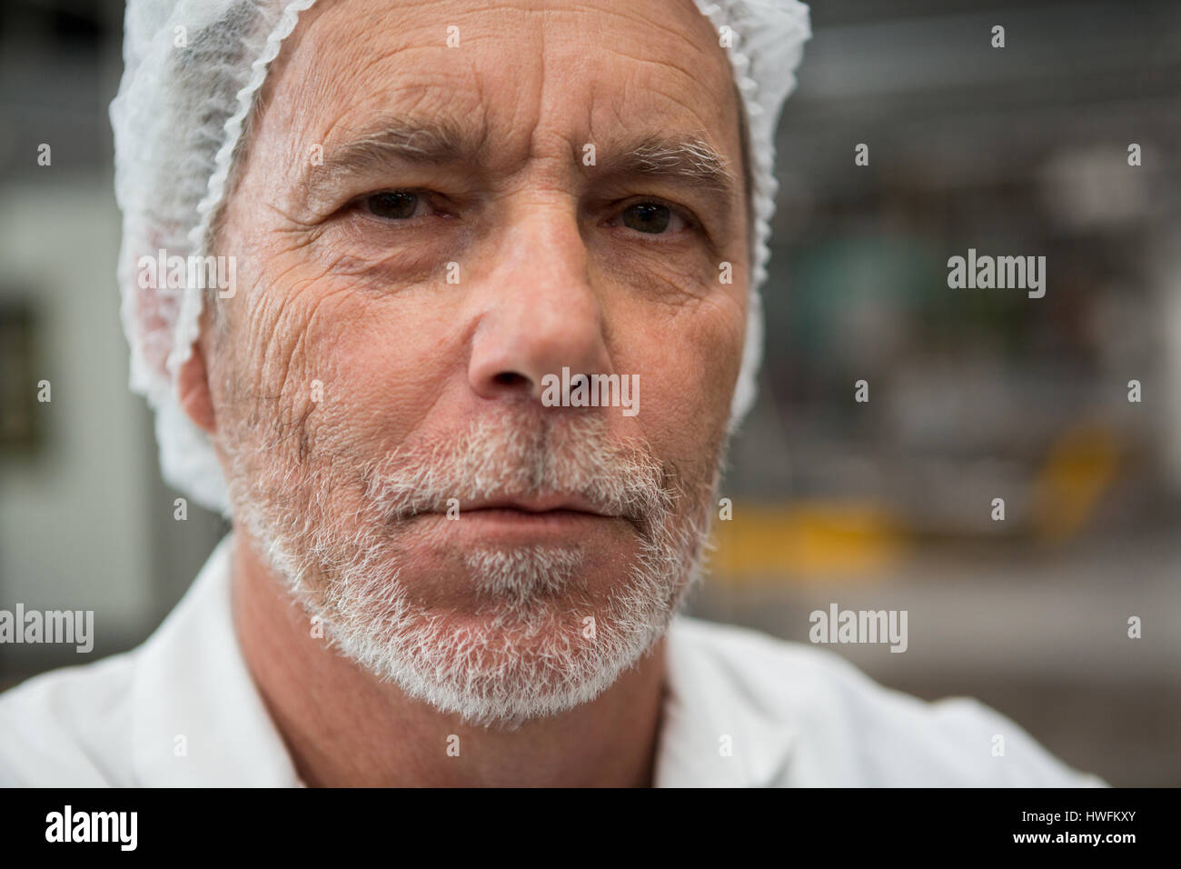Elderly worker factory hi-res stock photography and images - Alamy