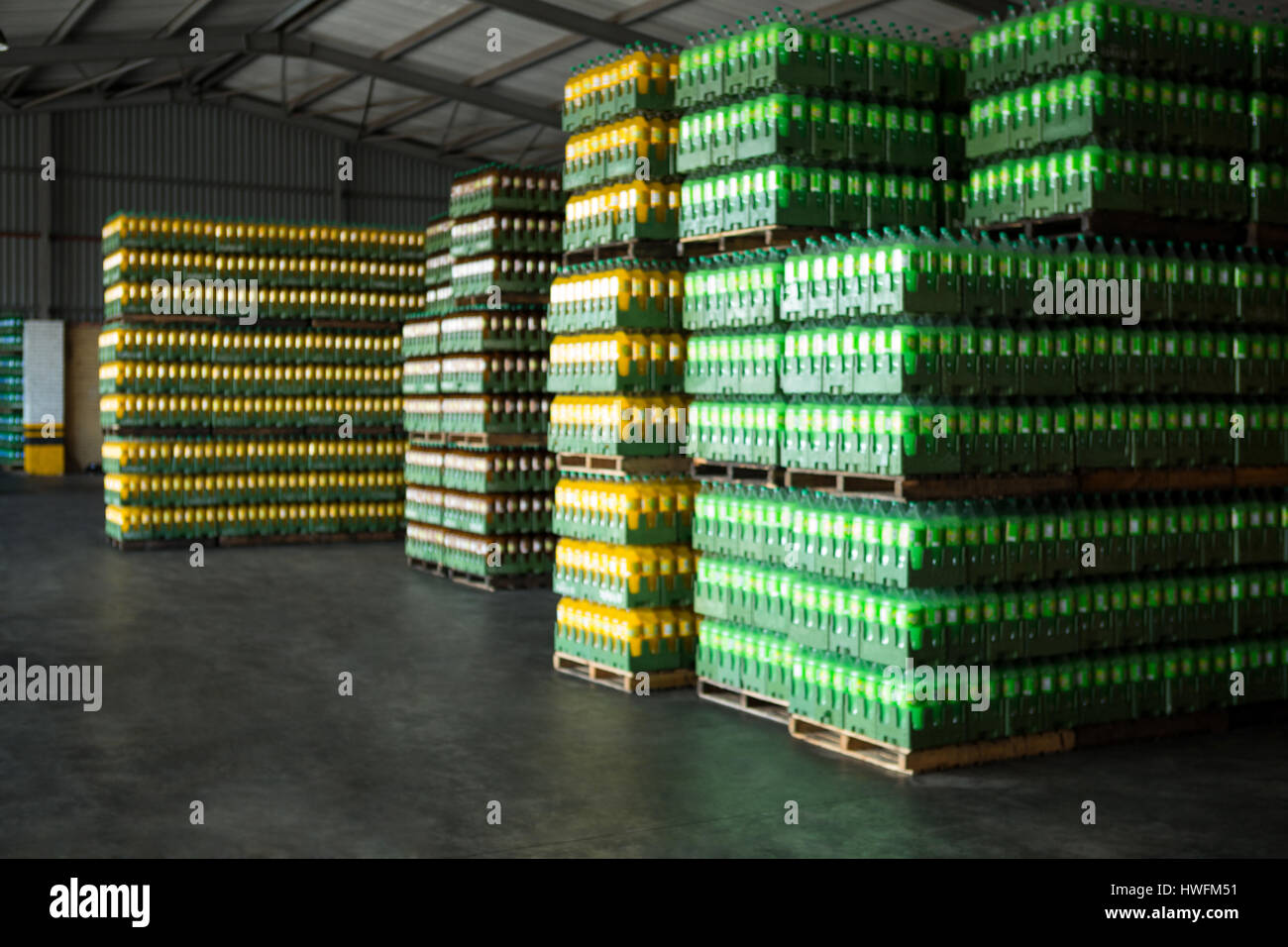 Stack of packed juice bottles in factory Stock Photo - Alamy