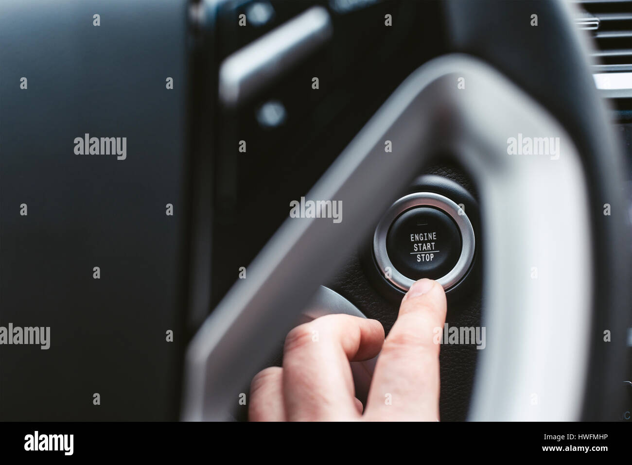 Engine start button and finger with shallow depth of field Stock Photo ...