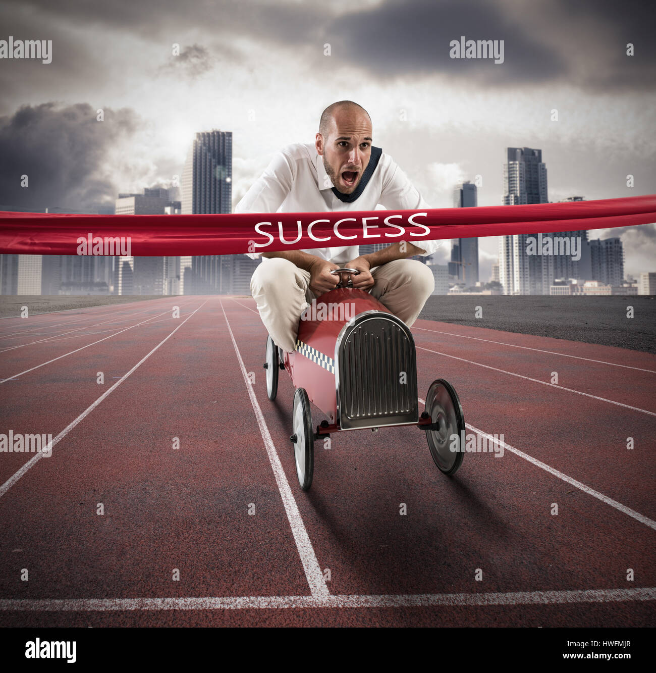 Successful businessman on the finishing line Stock Photo - Alamy