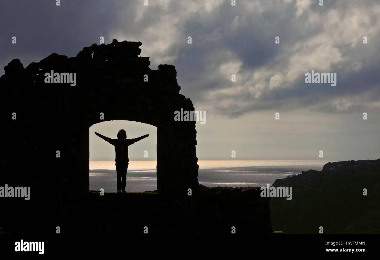 Person overlooking the ocean from the World War 2 ruins at Kirkehamn on ...
