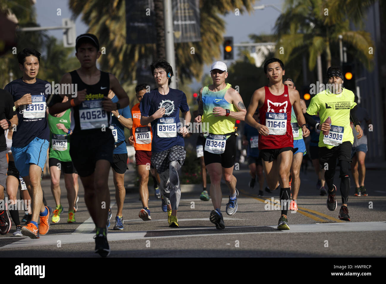 Beverly Hills, CA, USA. 19th Mar, 2017. Runners travel down Rodeo Drive ...