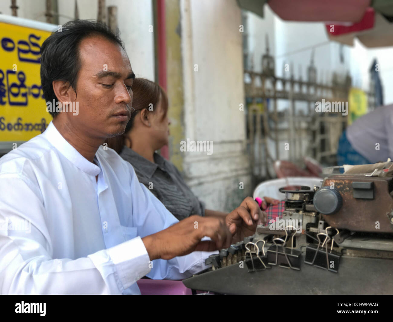 Yangon, Myanmar. 10th Feb, 2017. A man works at his typewriter in ...
