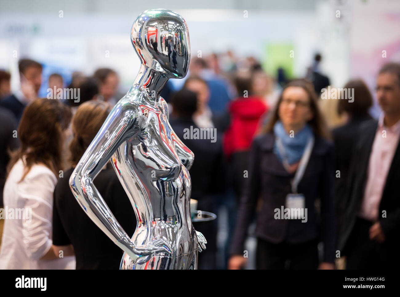 Hanover, Germany. 21st Mar, 2017. A silver humanoid figure can be seen ...