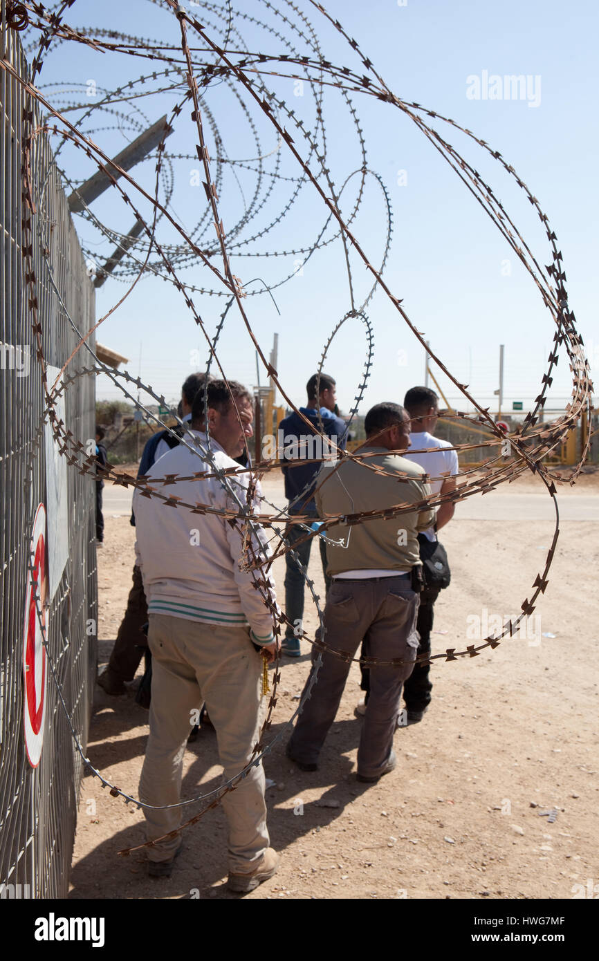 Palestinians and soldier at Checkpoint of Separation Barrier in Israeli ...