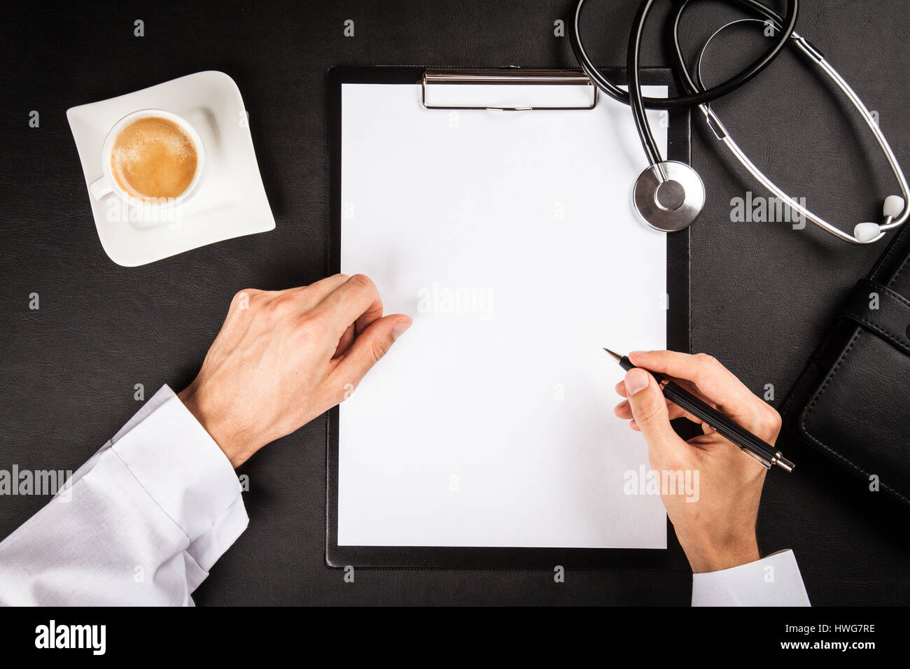 Doctor's working table Stock Photo - Alamy
