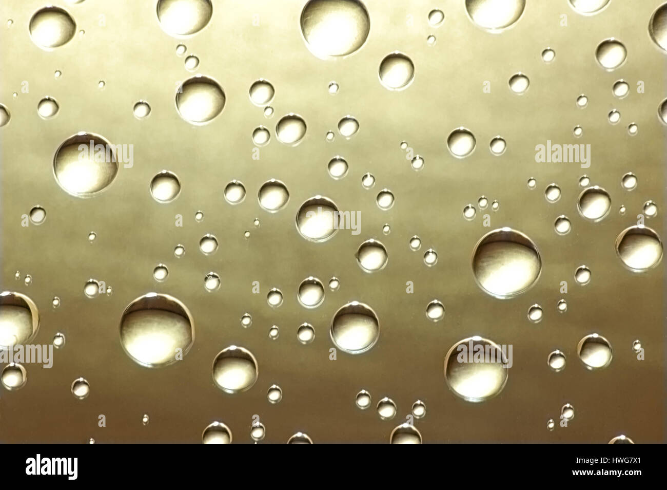Golden water drops texture water hi-res stock photography and images ...