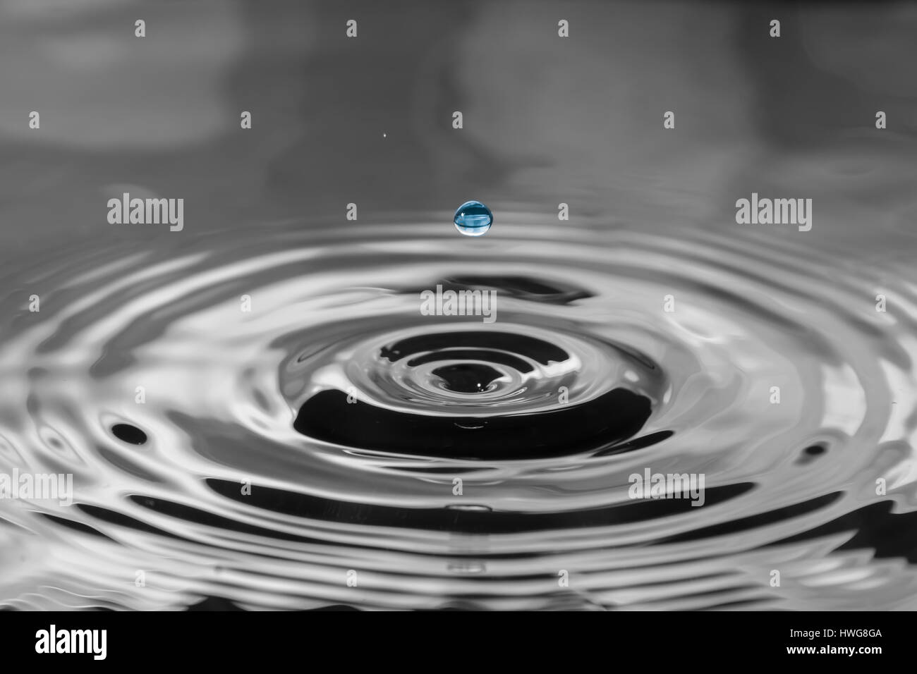 Water drop in motion Stock Photo - Alamy