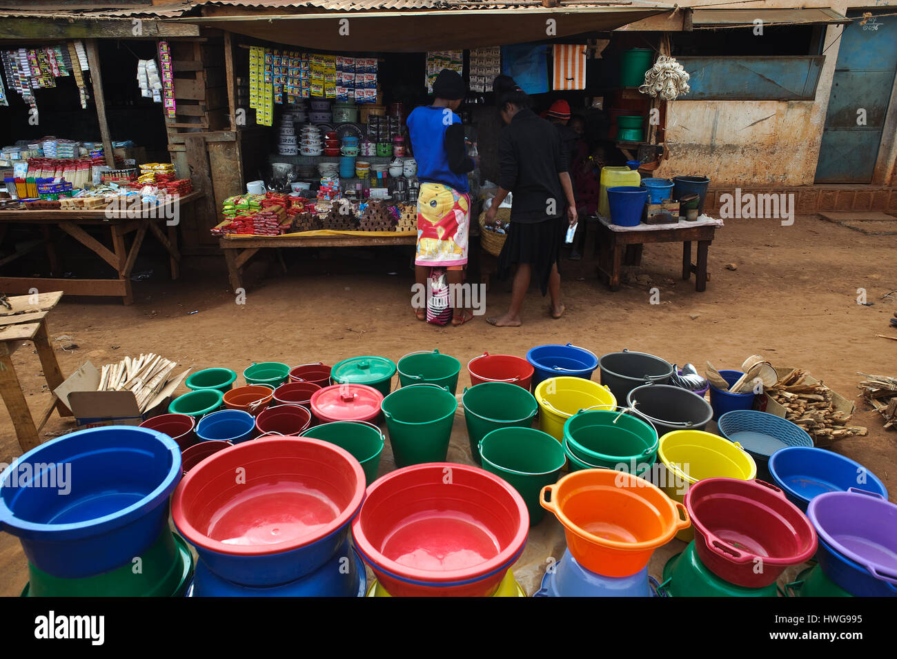 Market ( Madagascar). Small grocery shop selling plastic buckets Stock ...
