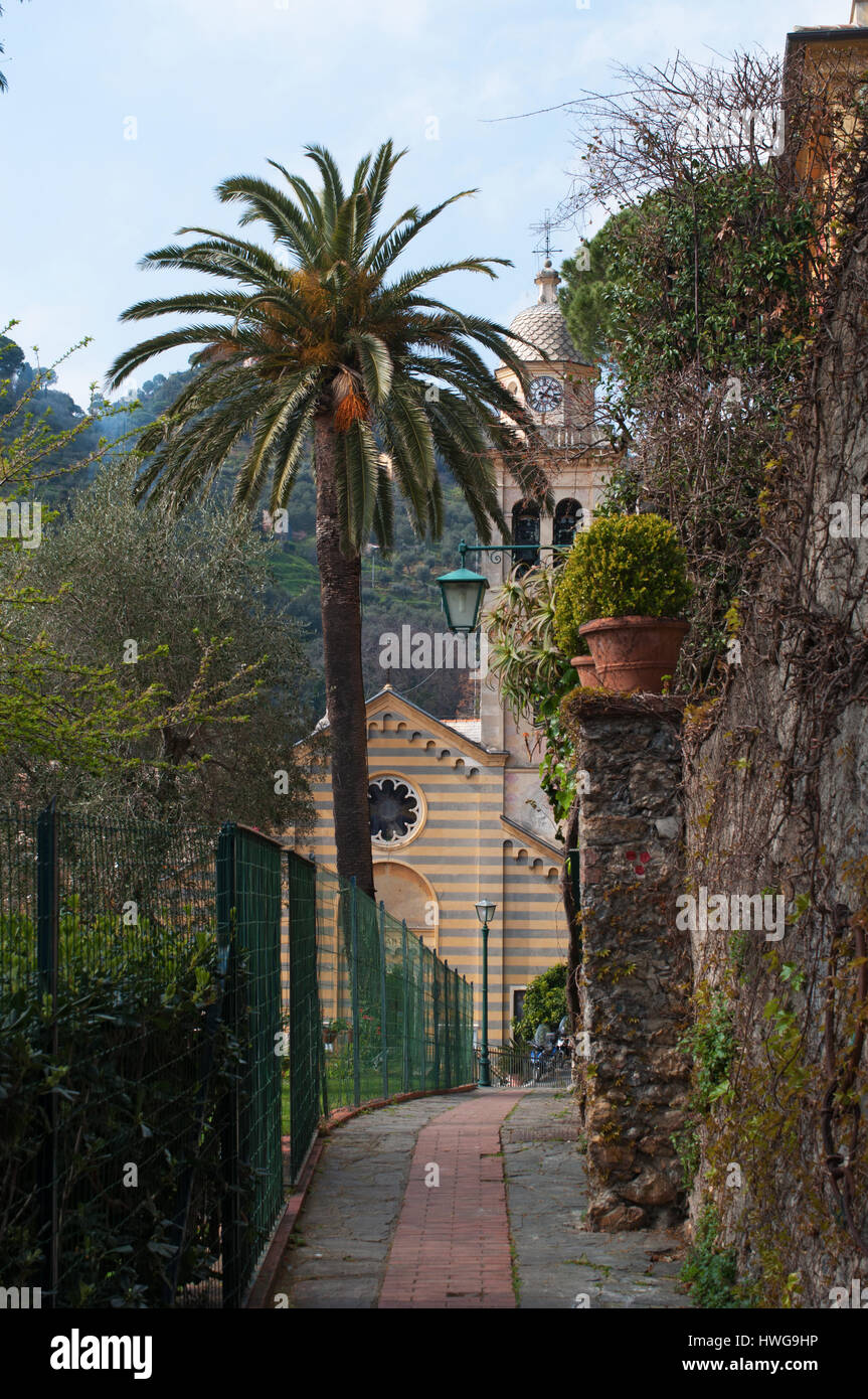 Portofino: view of the 12th century Church of St. Martin, striped ...