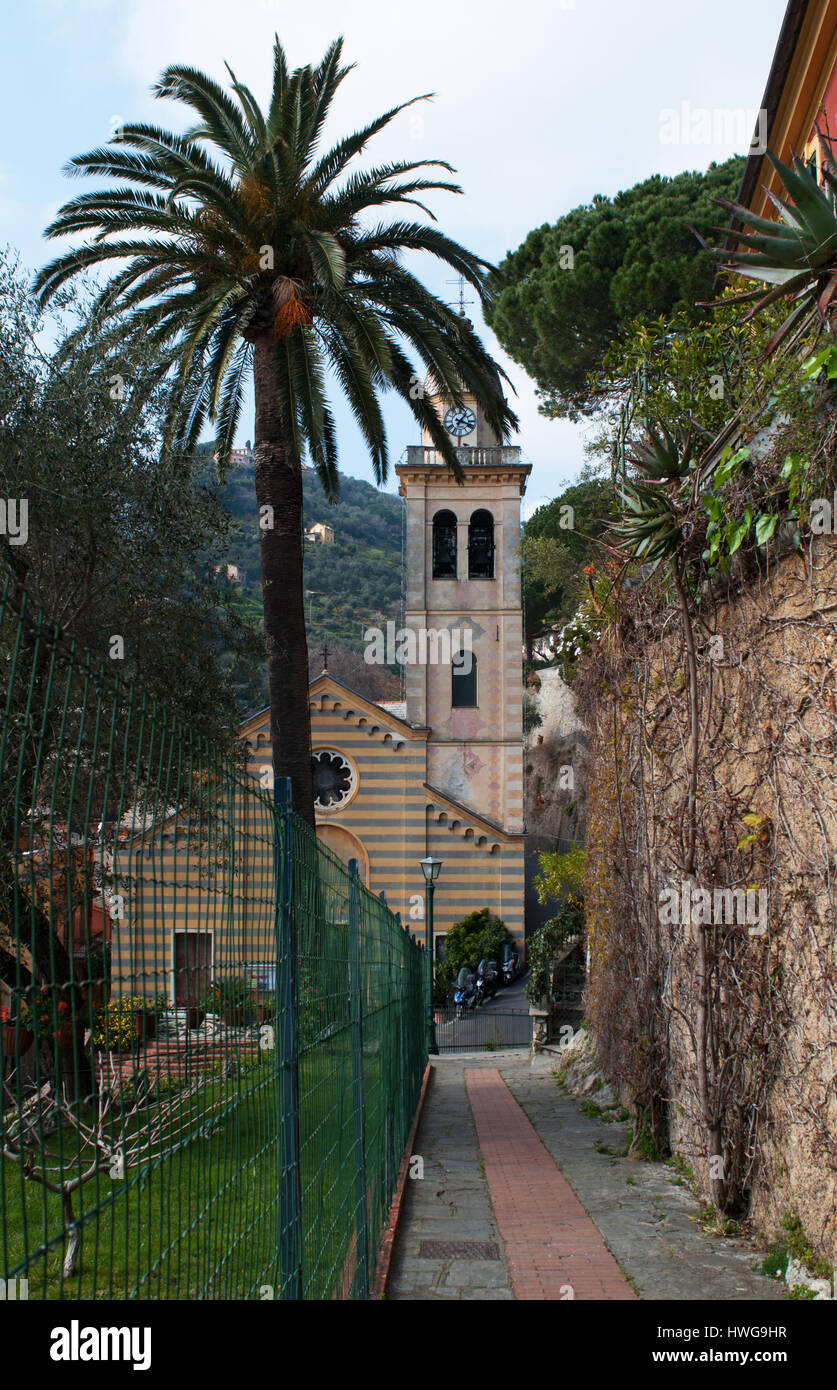 Portofino: view of the 12th century Church of St. Martin, striped ...