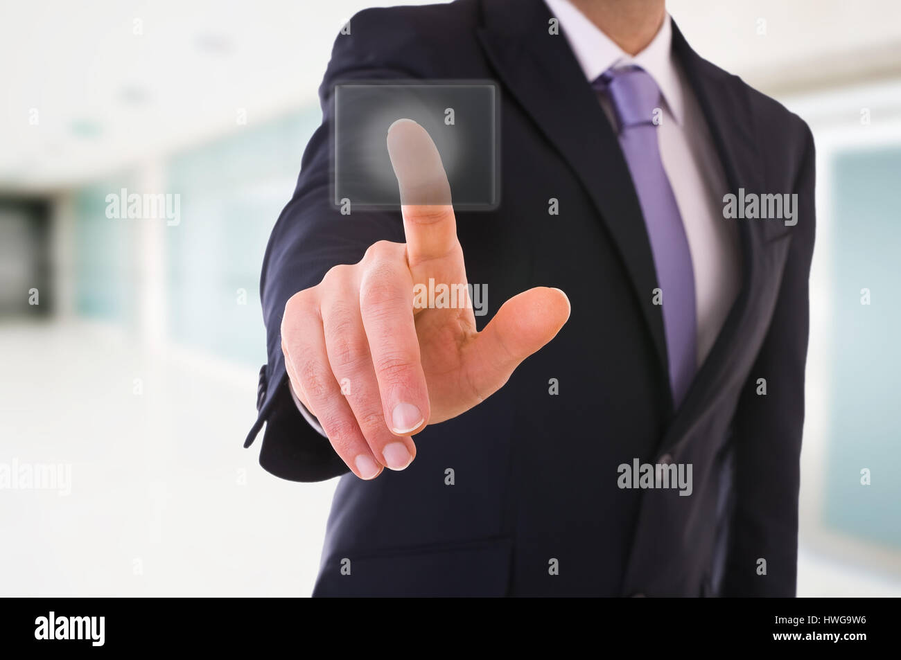 Businessman touching button Stock Photo - Alamy