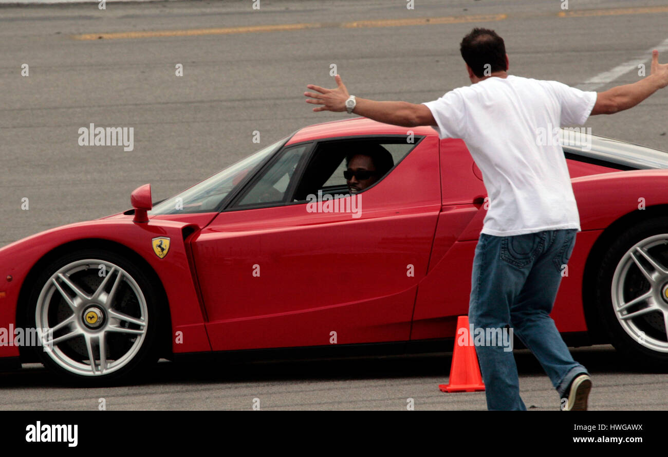 Producer Daniel Sadek,right, talks to actor Eddie Griffin before he ...