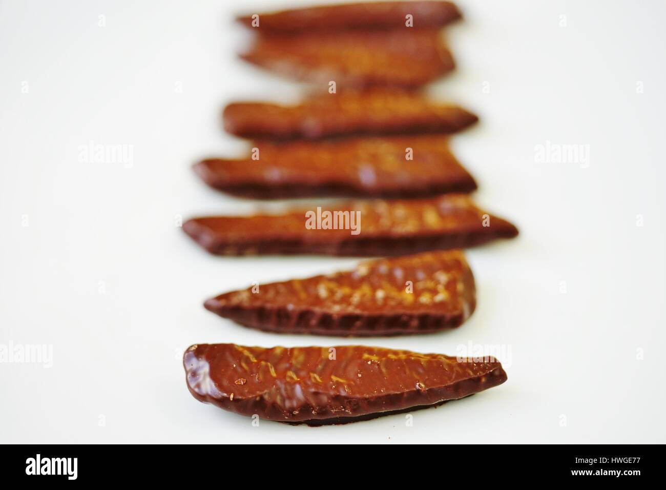 Candied orange rind covered with French dark chocolate Stock Photo - Alamy