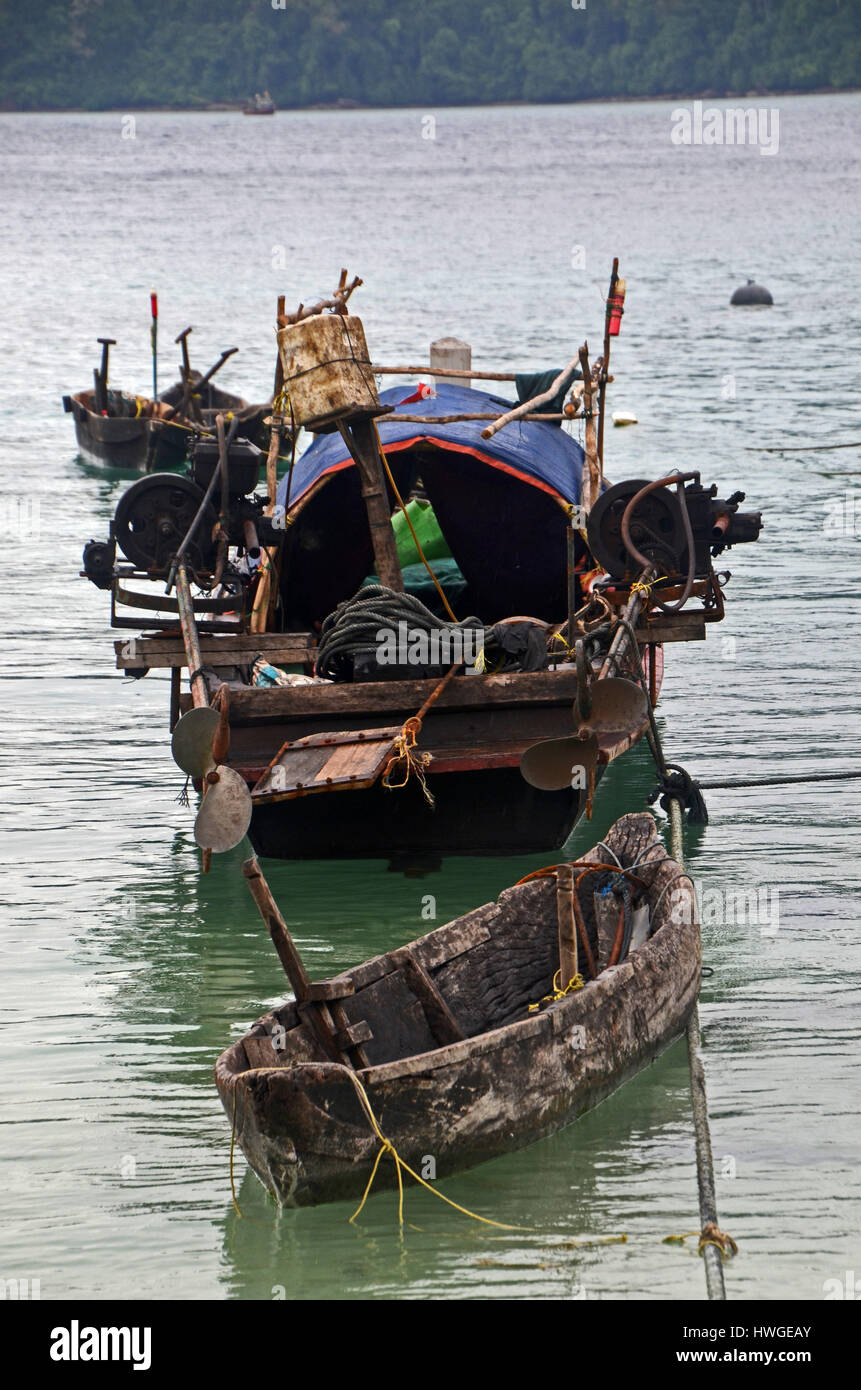 Fishing boats in the channel beside the village of Makyone Galet, Lampi ...