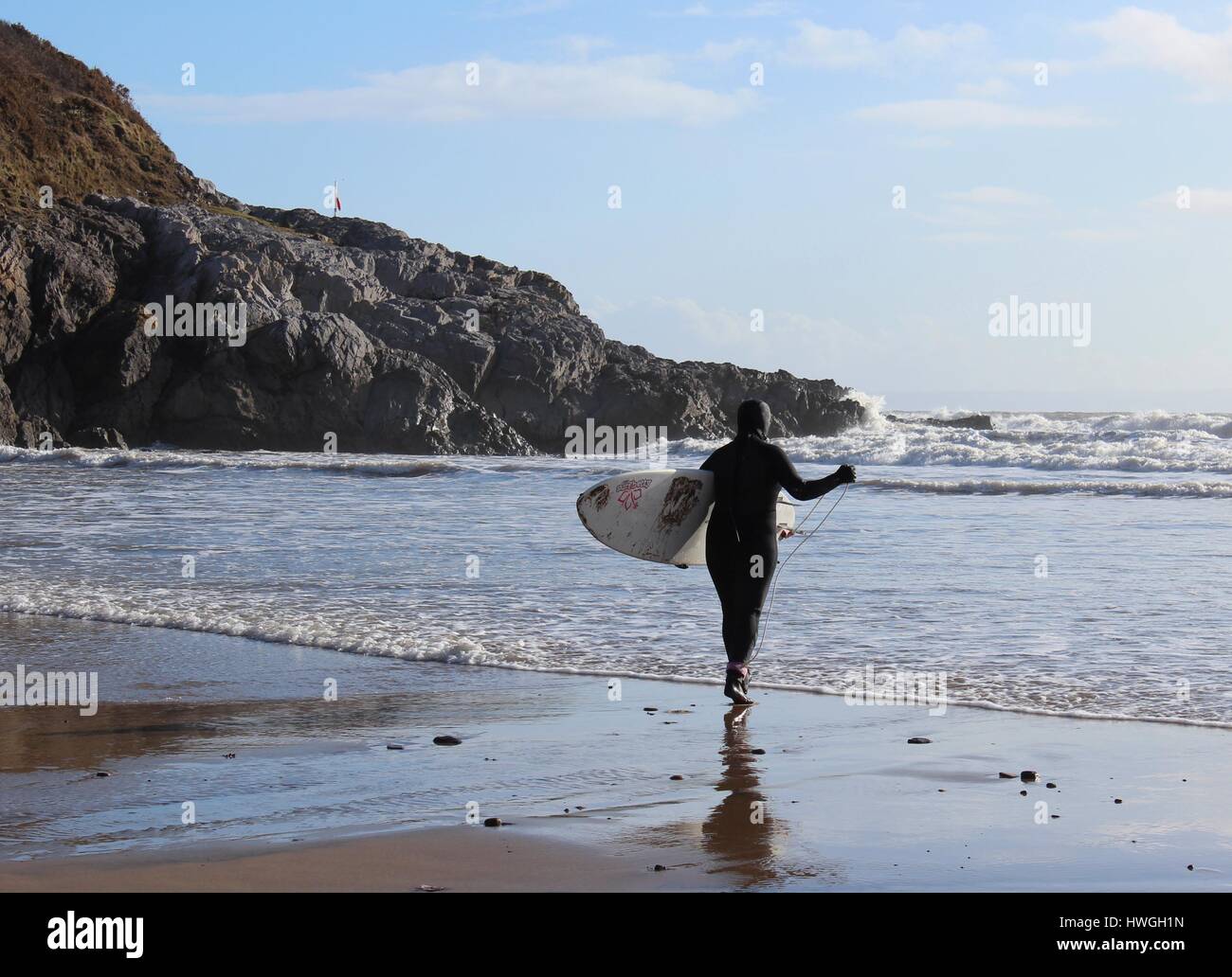 Water snowboard. The athlete with snowboard hold on to the rope and the ...