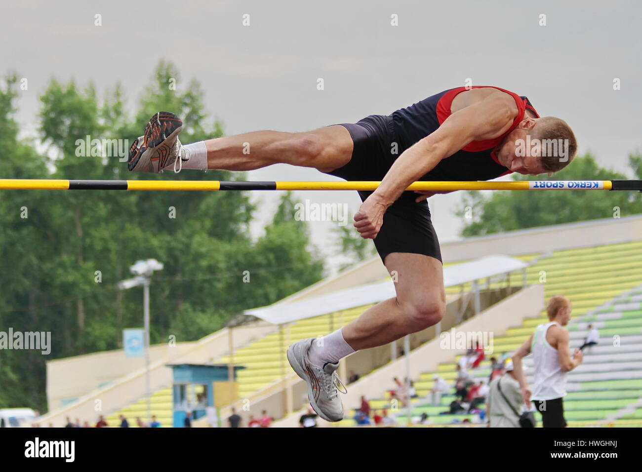Man doing exercises on the horizontal bar Stock Photo - Alamy