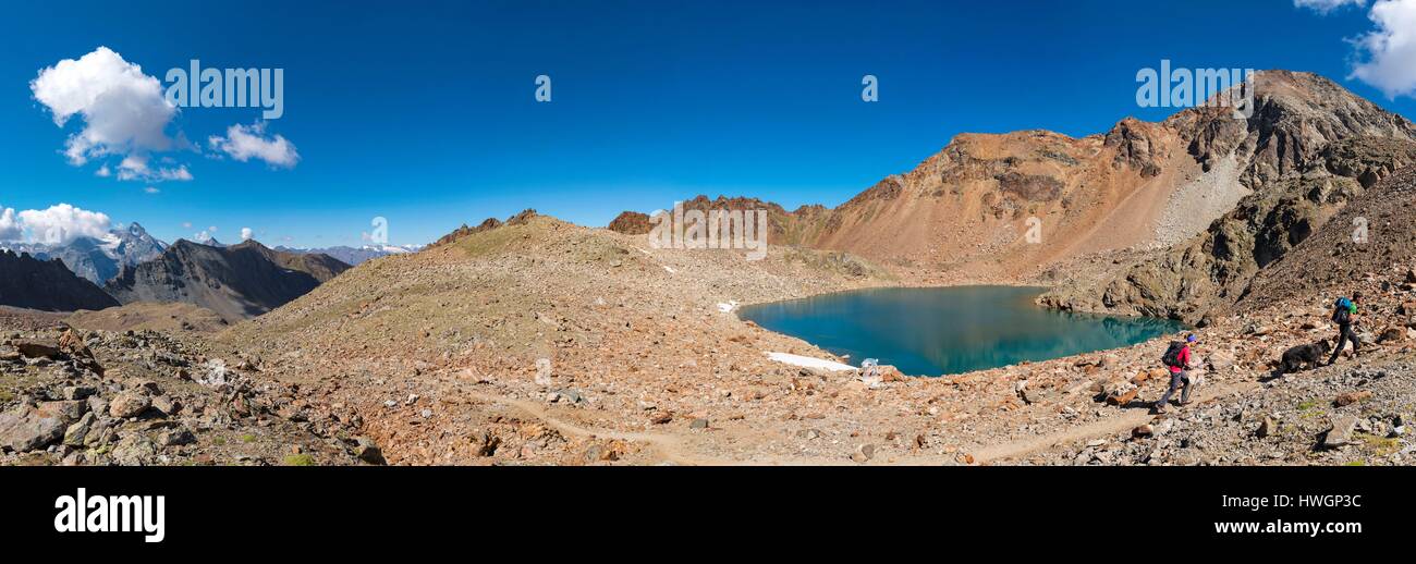 Italy, Valle d'Aosta, Aosta, Pila, Hiker ascending towards Mount ...
