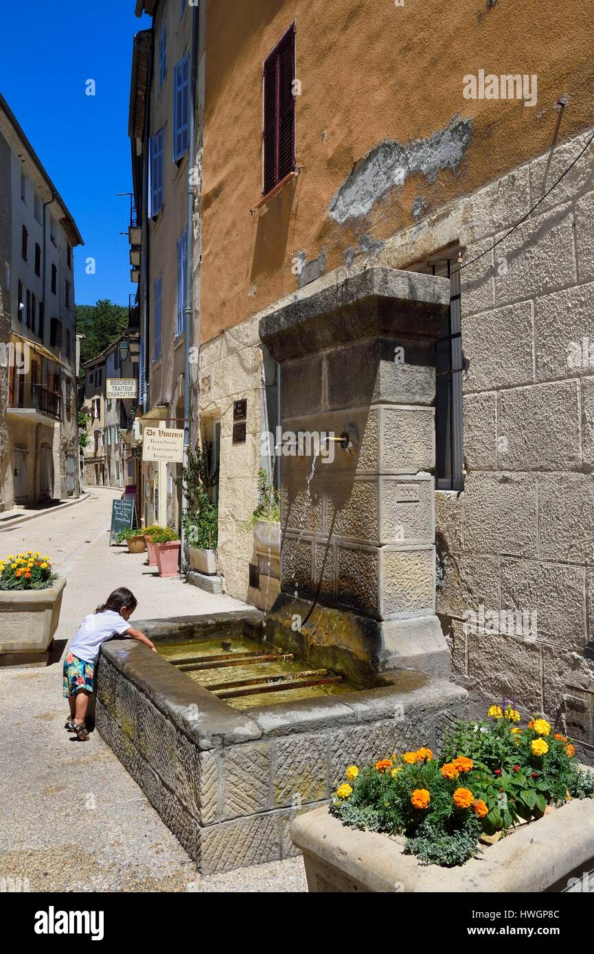 France, Alpes de Haute Provence, Annot, fountain at the entrance of the ...