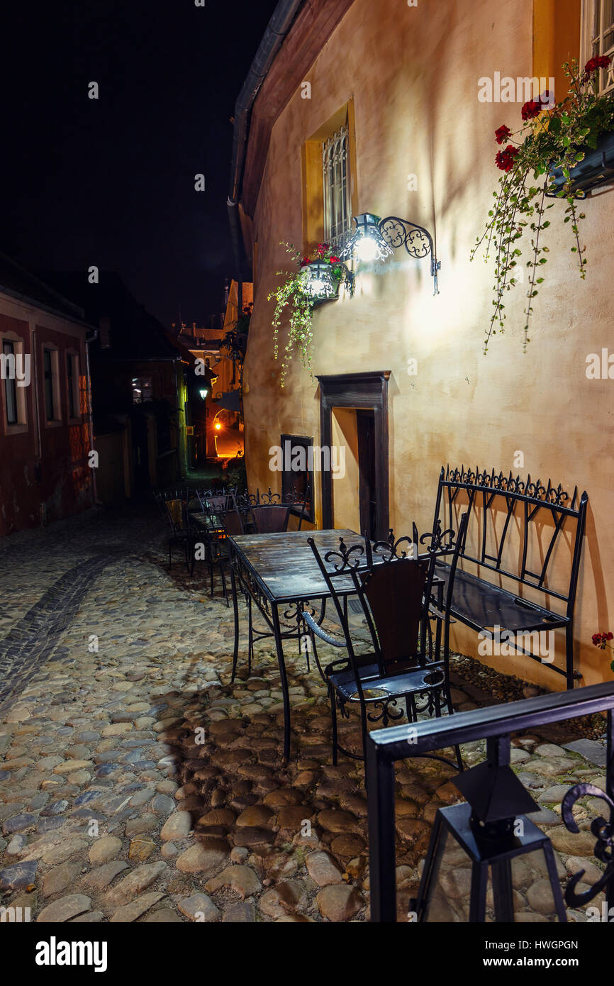 street cafe bar at night in Romania Stock Photo - Alamy