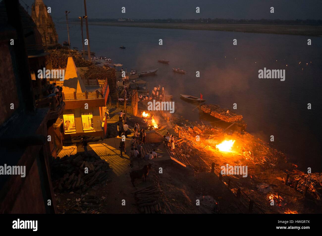 Burning ghat along ganges river hi-res stock photography and images - Alamy