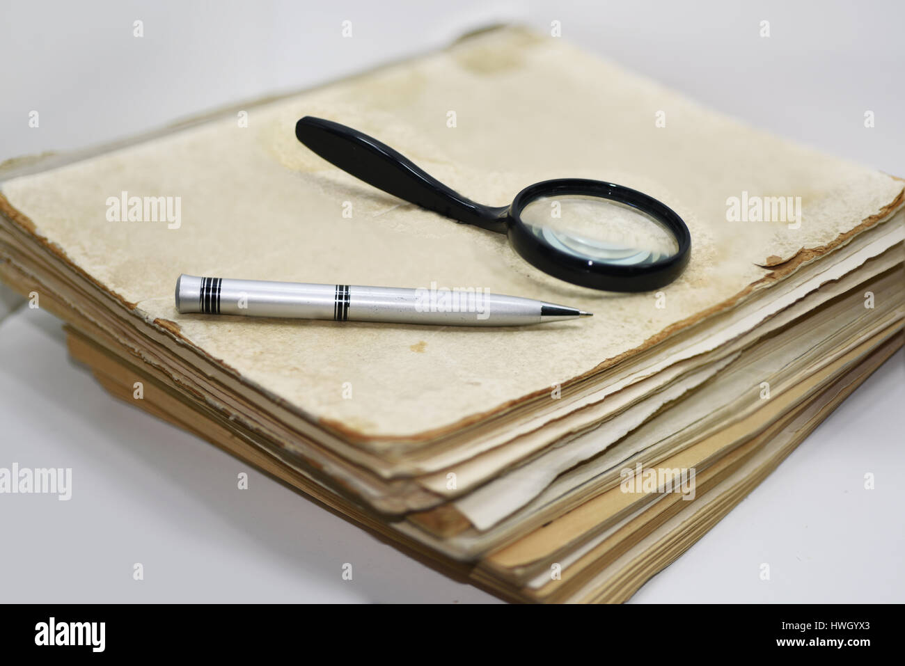 Old books with pen. Isolated documents on white background Stock Photo ...