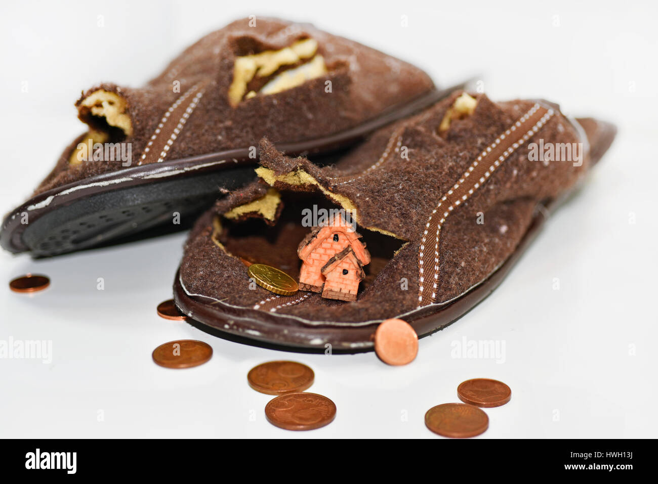 Leaky brown slippers Stock Photo - Alamy