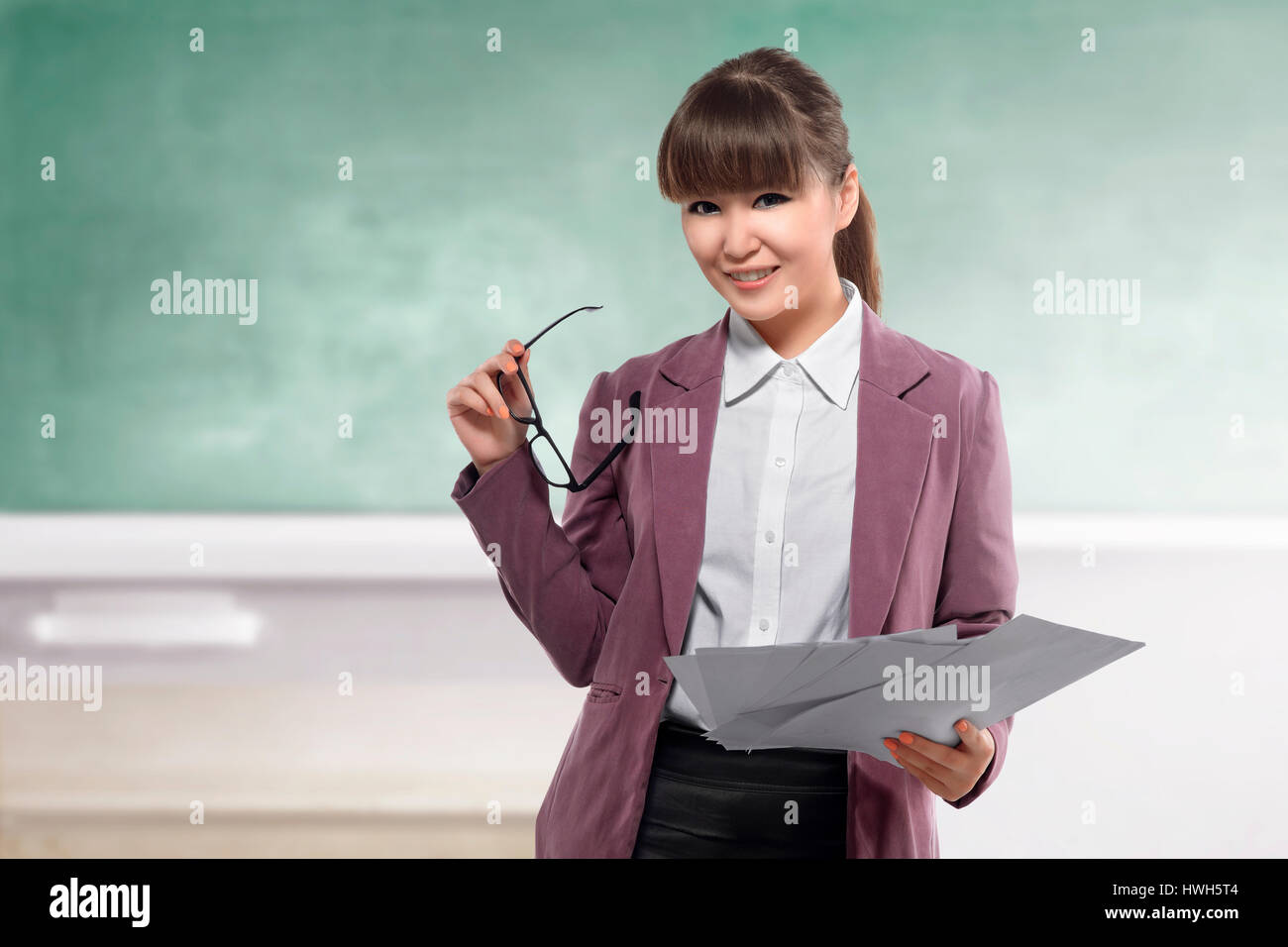 Asian teacher glasses classroom hi-res stock photography and images - Alamy