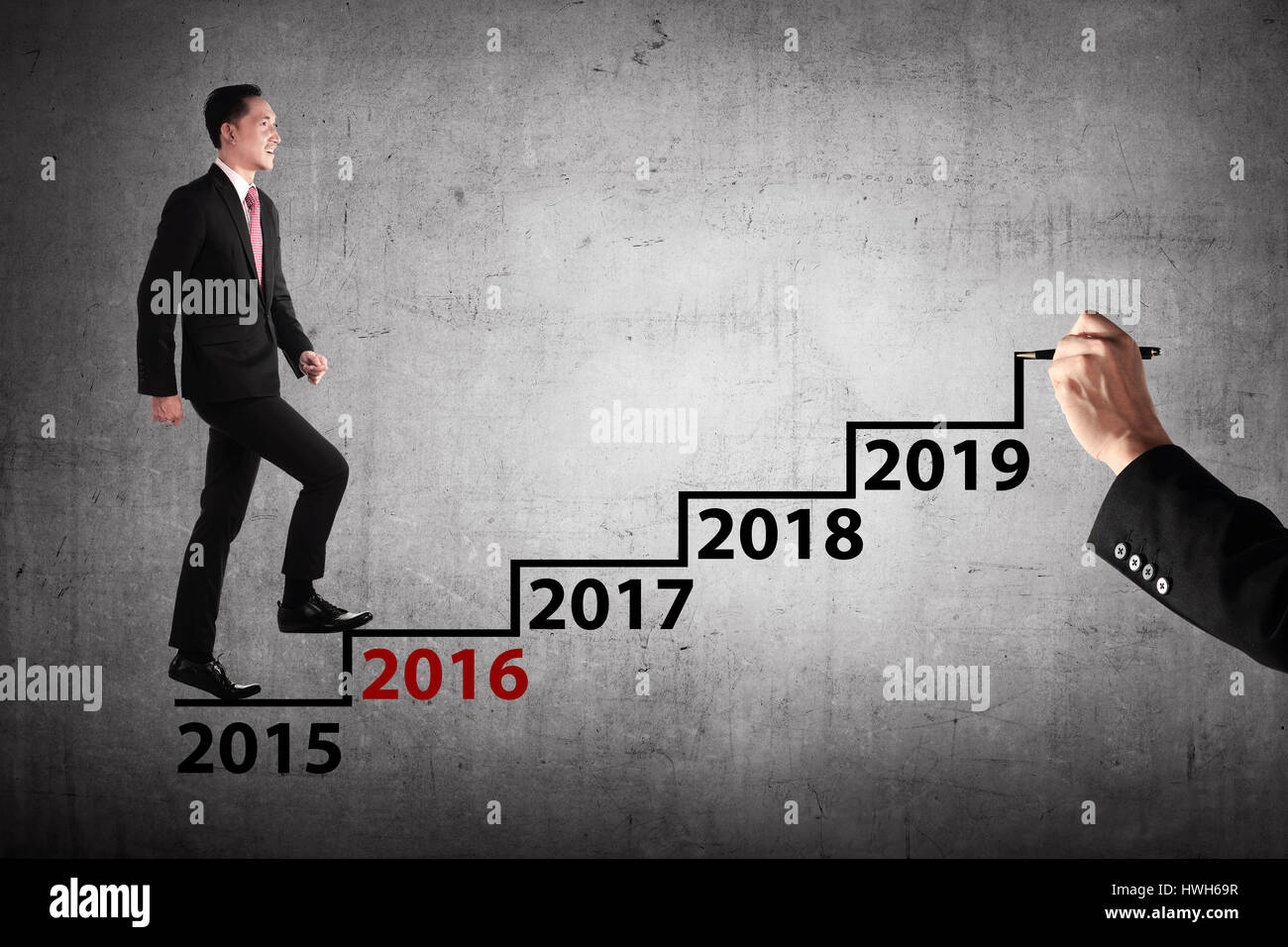 Business person step into hand drawing stair with 2016 year on it ...