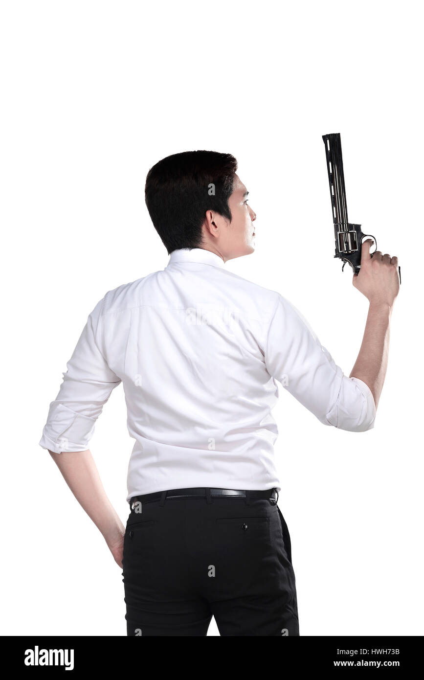 Portrait of srcret agent holding a gun isolated over a white background ...