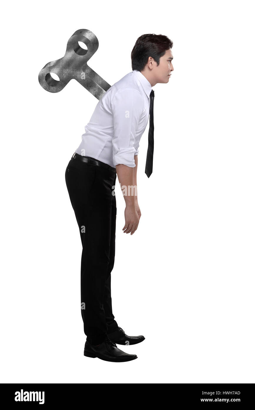 Asian business man have winding key on his back isolated over white ...