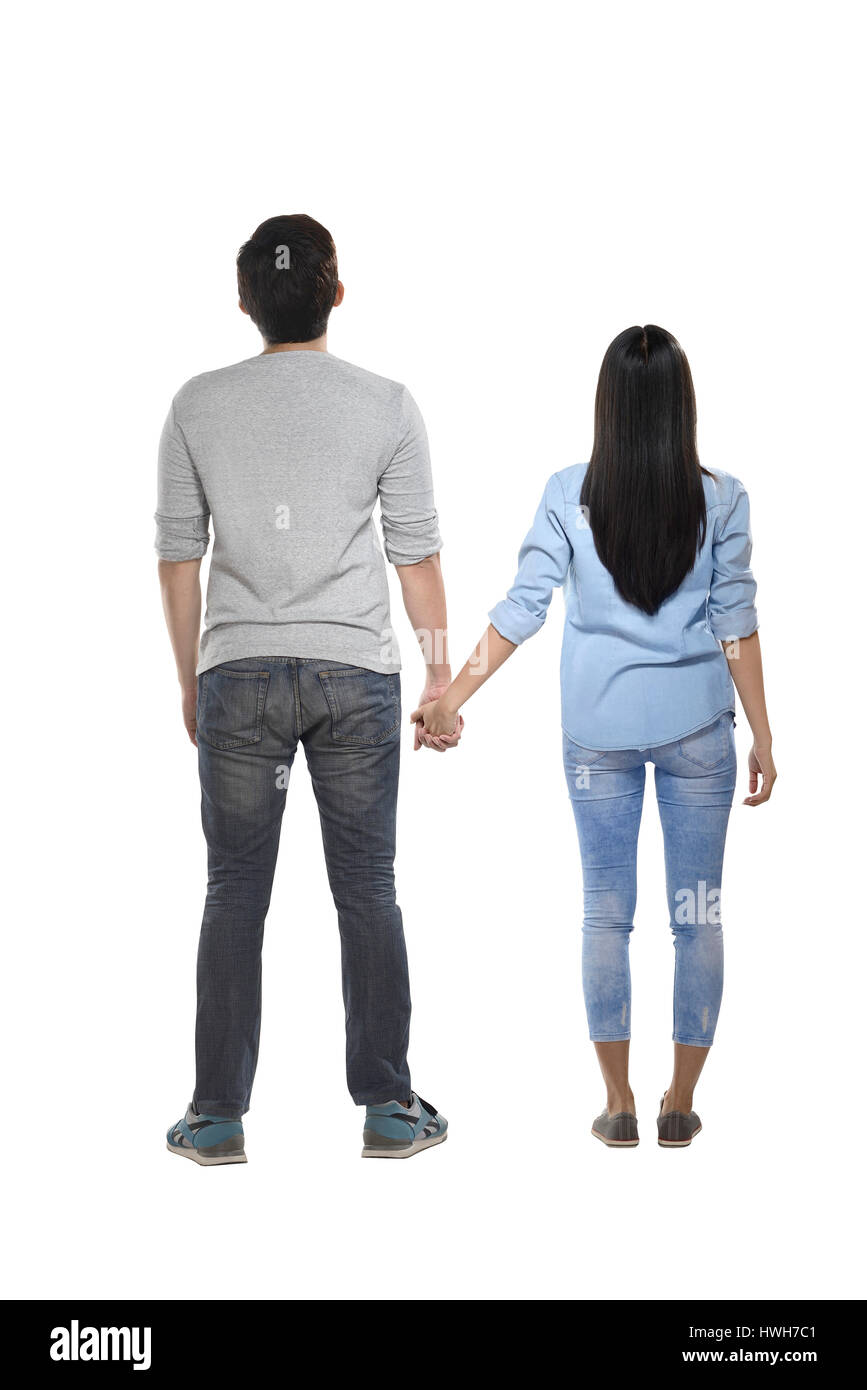 Back view of asian couple isolated over white background Stock Photo ...