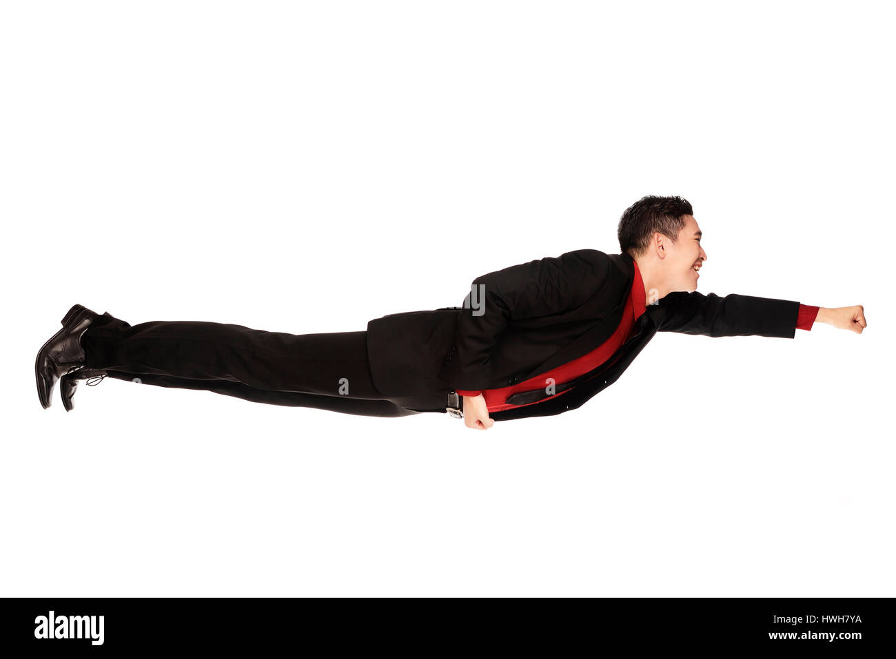 Man posing flying isolated over white background Stock Photo - Alamy