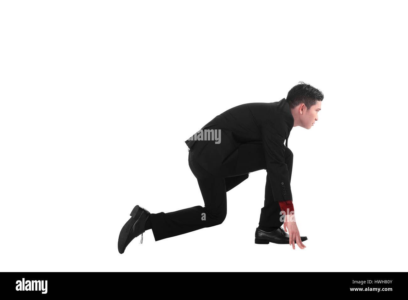Asian business man start running isolated over white background Stock ...