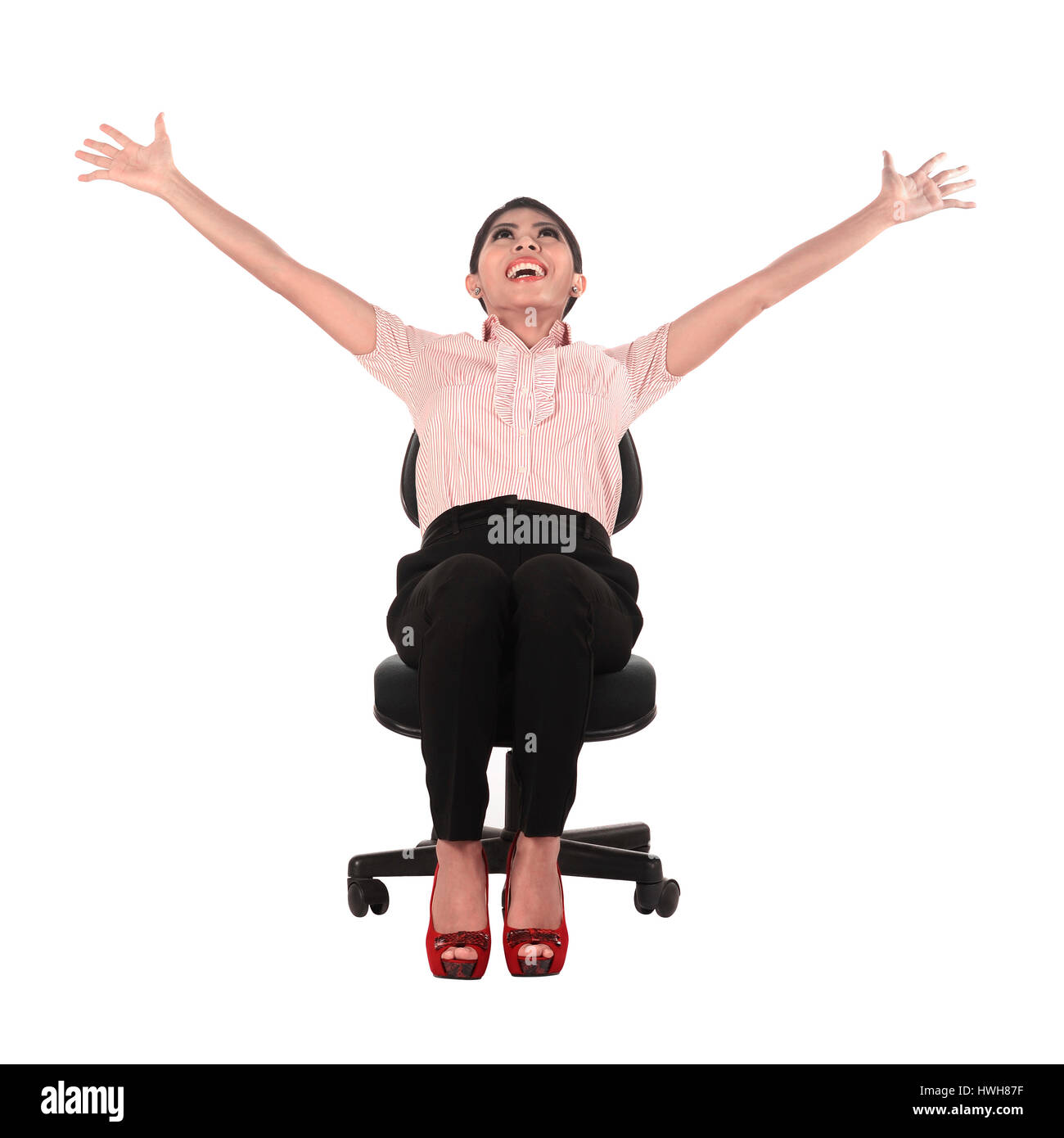 Asian business woman sitting isolated over white background Stock Photo ...