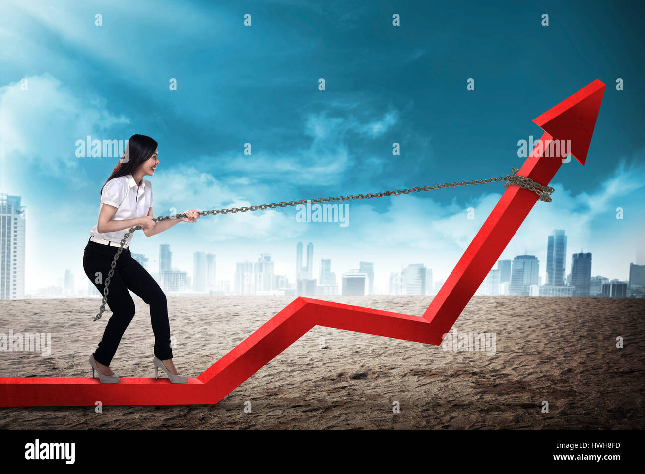 Image of young asian business woman pulling red arrow with chain Stock ...