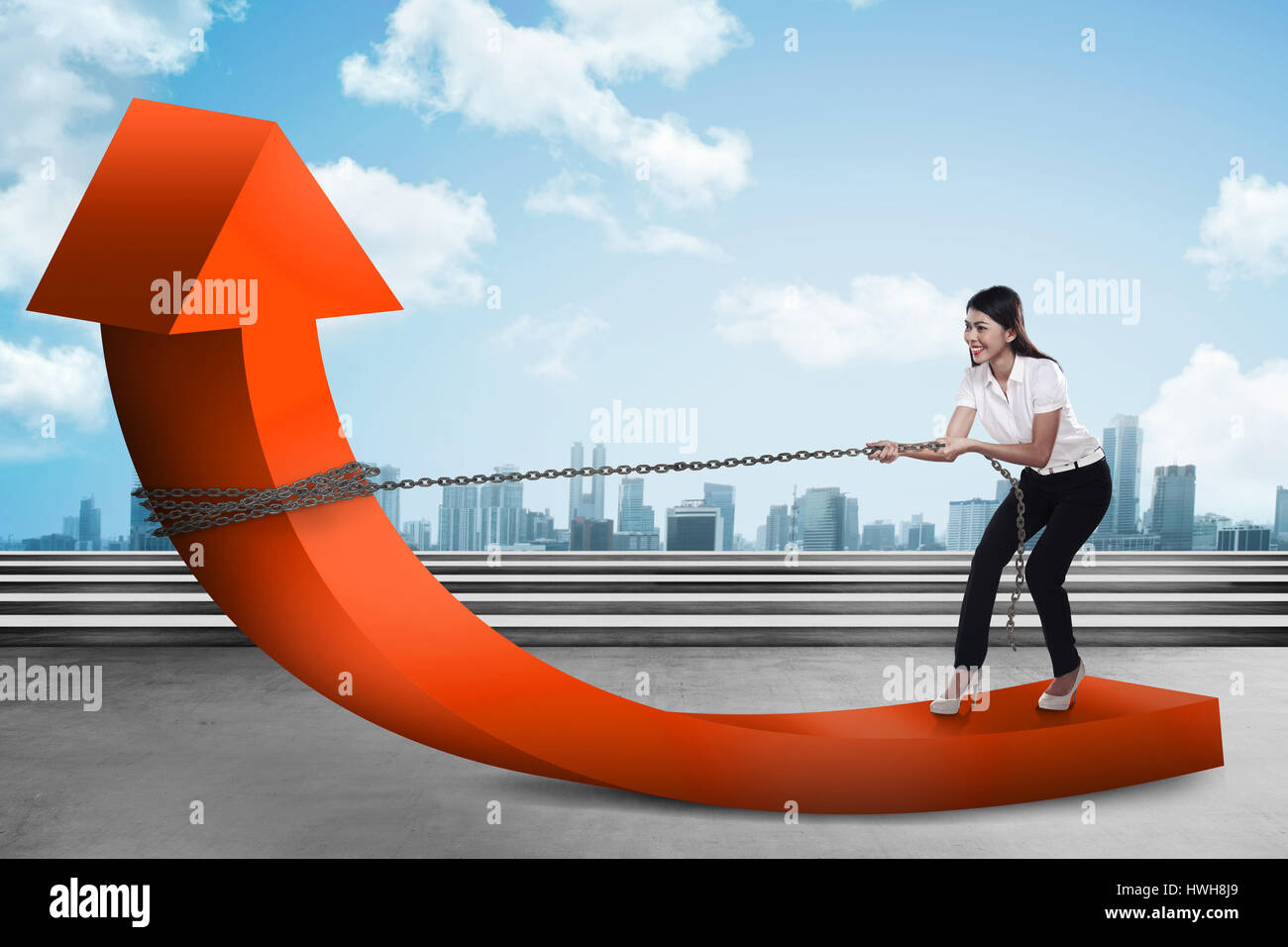 Image of asian business woman pulling red arrow with chain Stock Photo ...