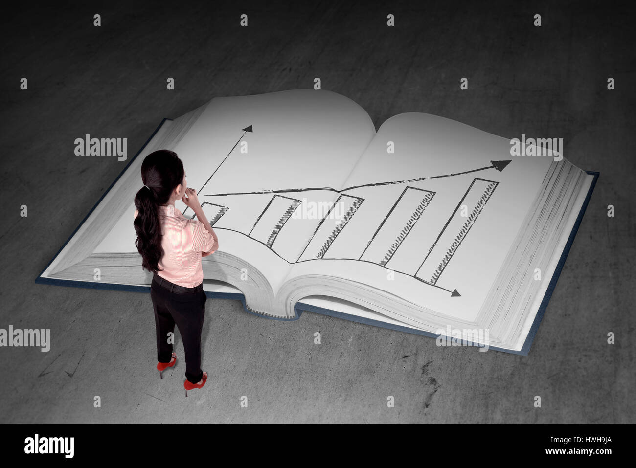 Business person looking book hi-res stock photography and images - Alamy