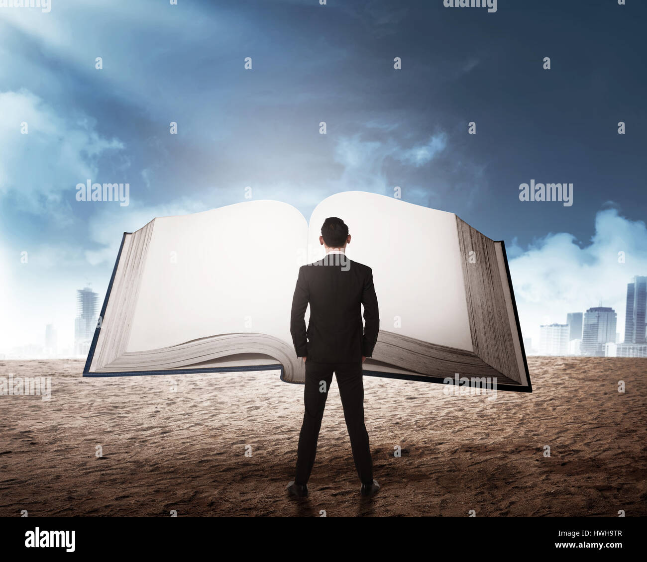Young business man reading big book. Business education concept Stock ...