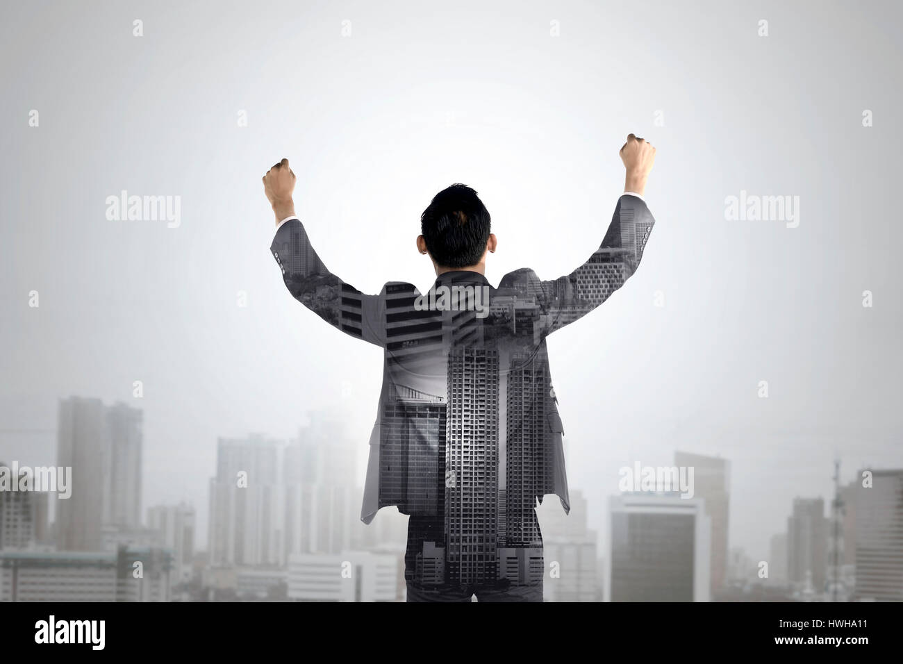 Double exposure of business man raise his hands. Business success ...