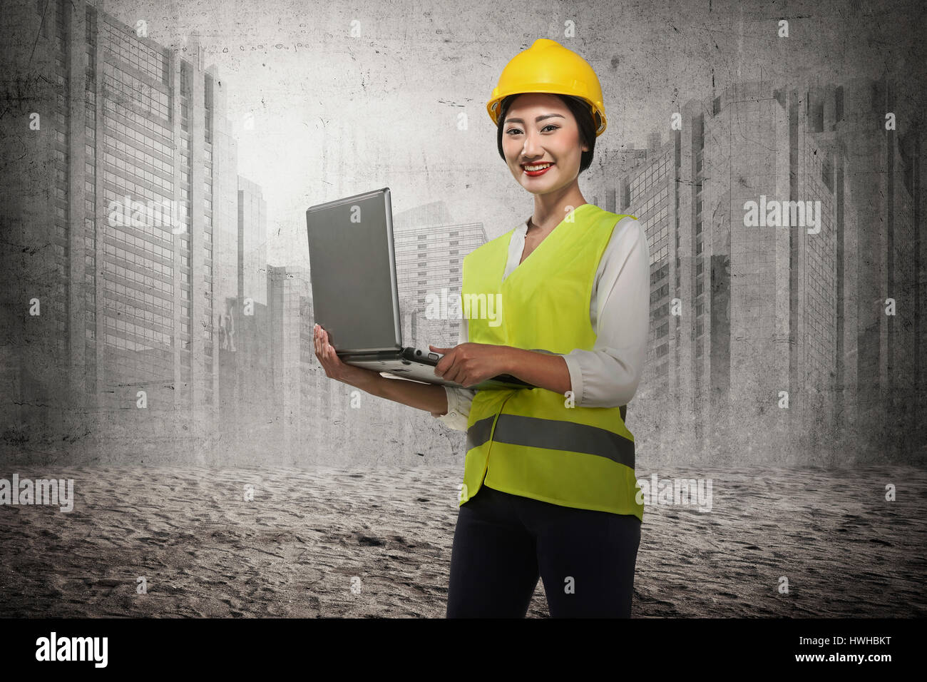 Female architect working at laptop hi-res stock photography and images ...