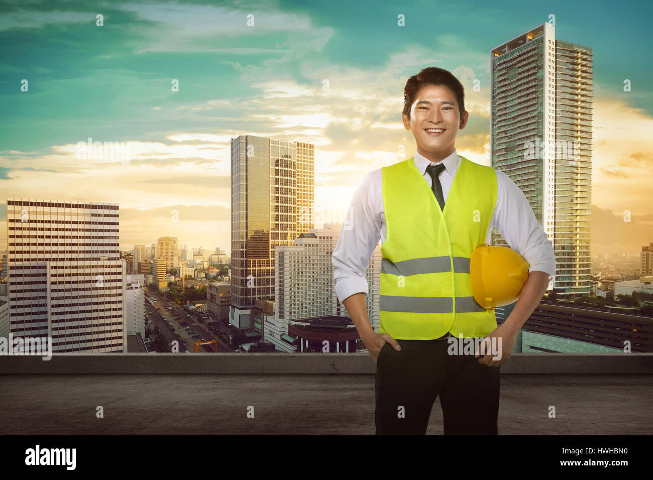 Asian engineer wearing safety vest. Industrial concept Stock Photo - Alamy