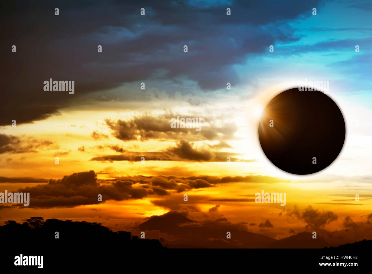 Total solar eclipse over the dark sky Stock Photo - Alamy